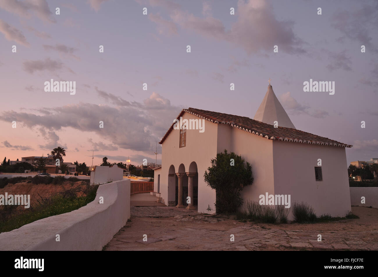 Chapel Nossa Senhora da Rocha on the cliffs in Lagoa, Algarve, Portugal ...