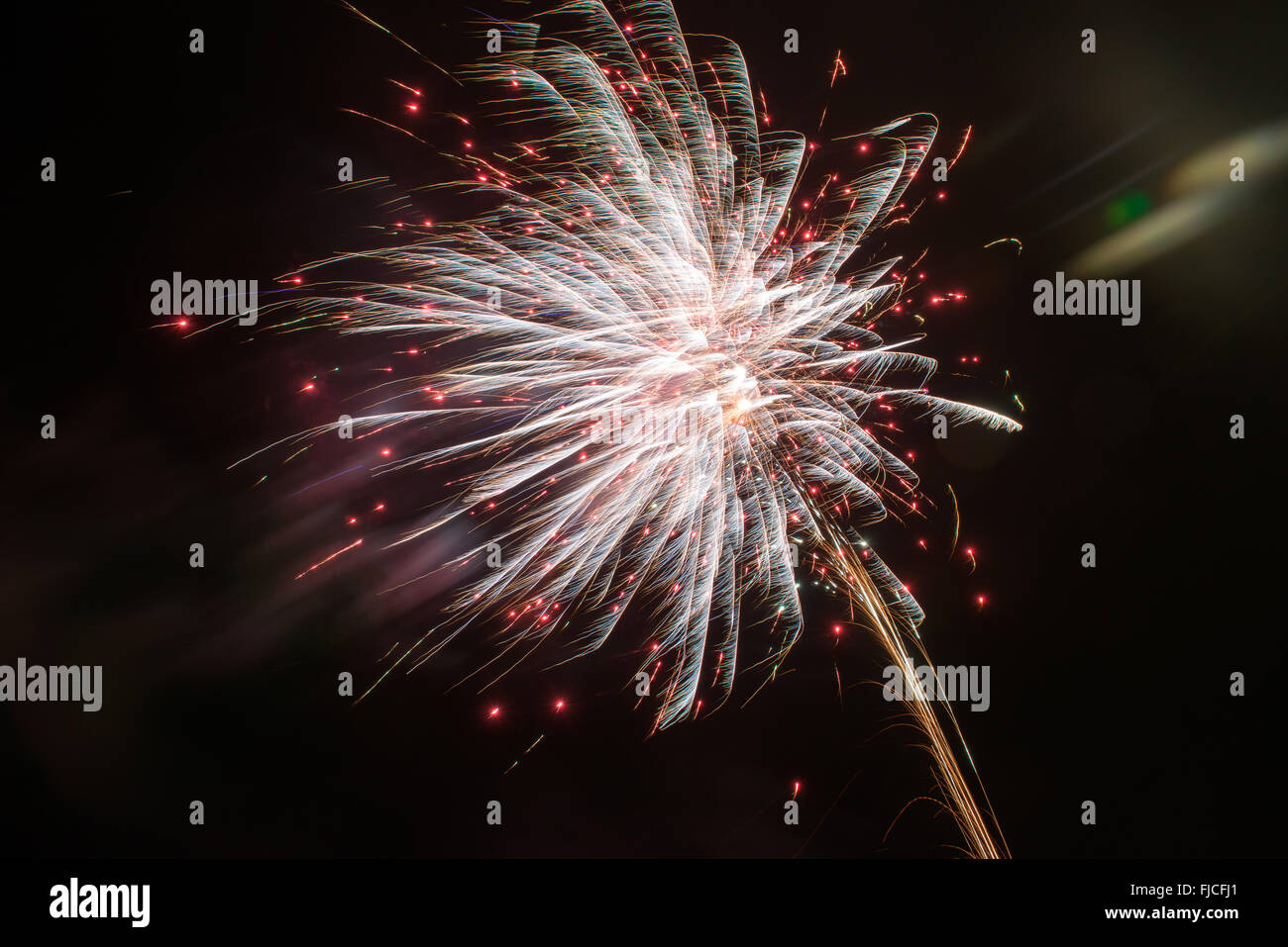 Fireworks exploding at night Stock Photo - Alamy