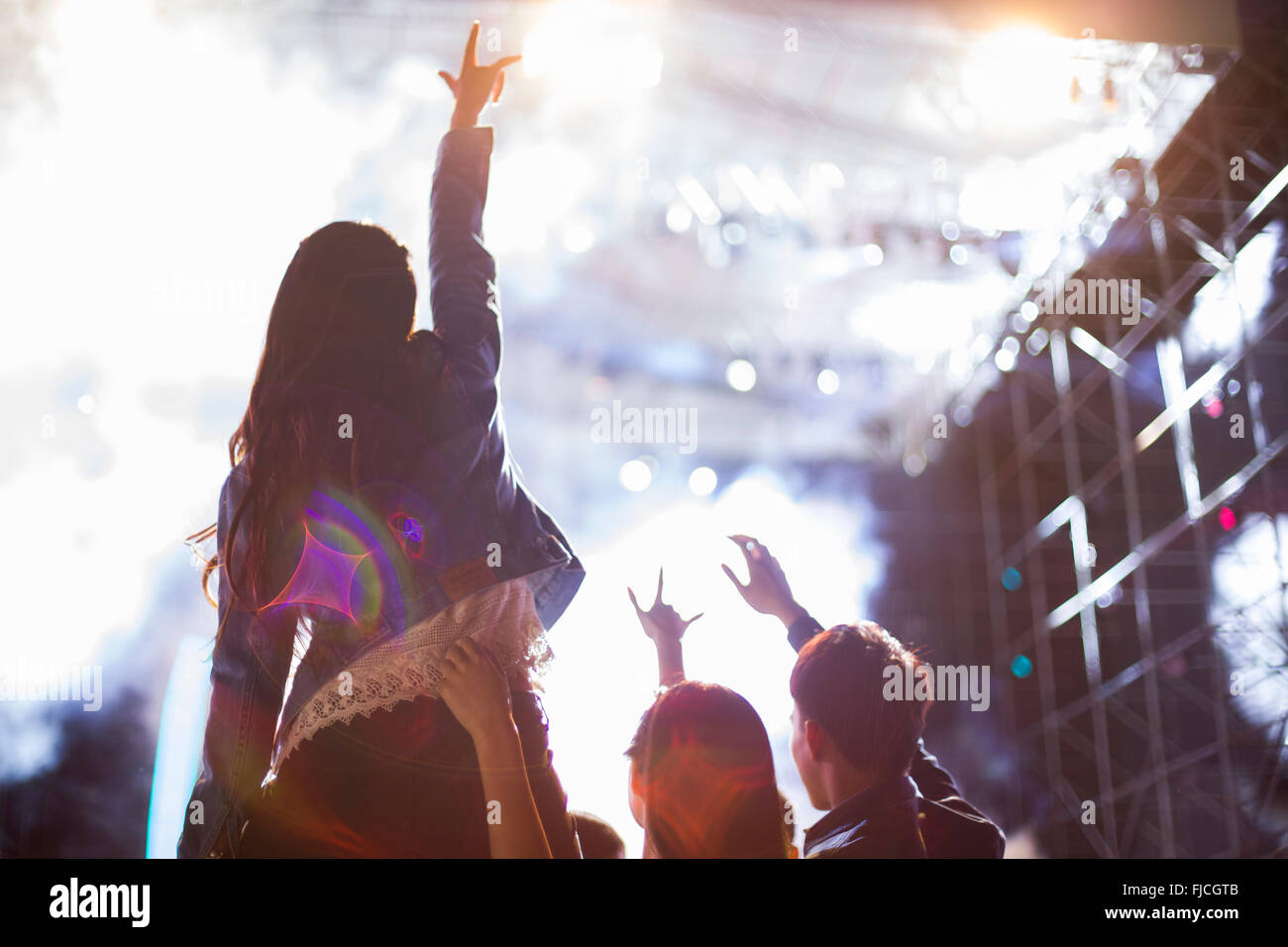 Happy Chinese friends at music festival Stock Photo - Alamy