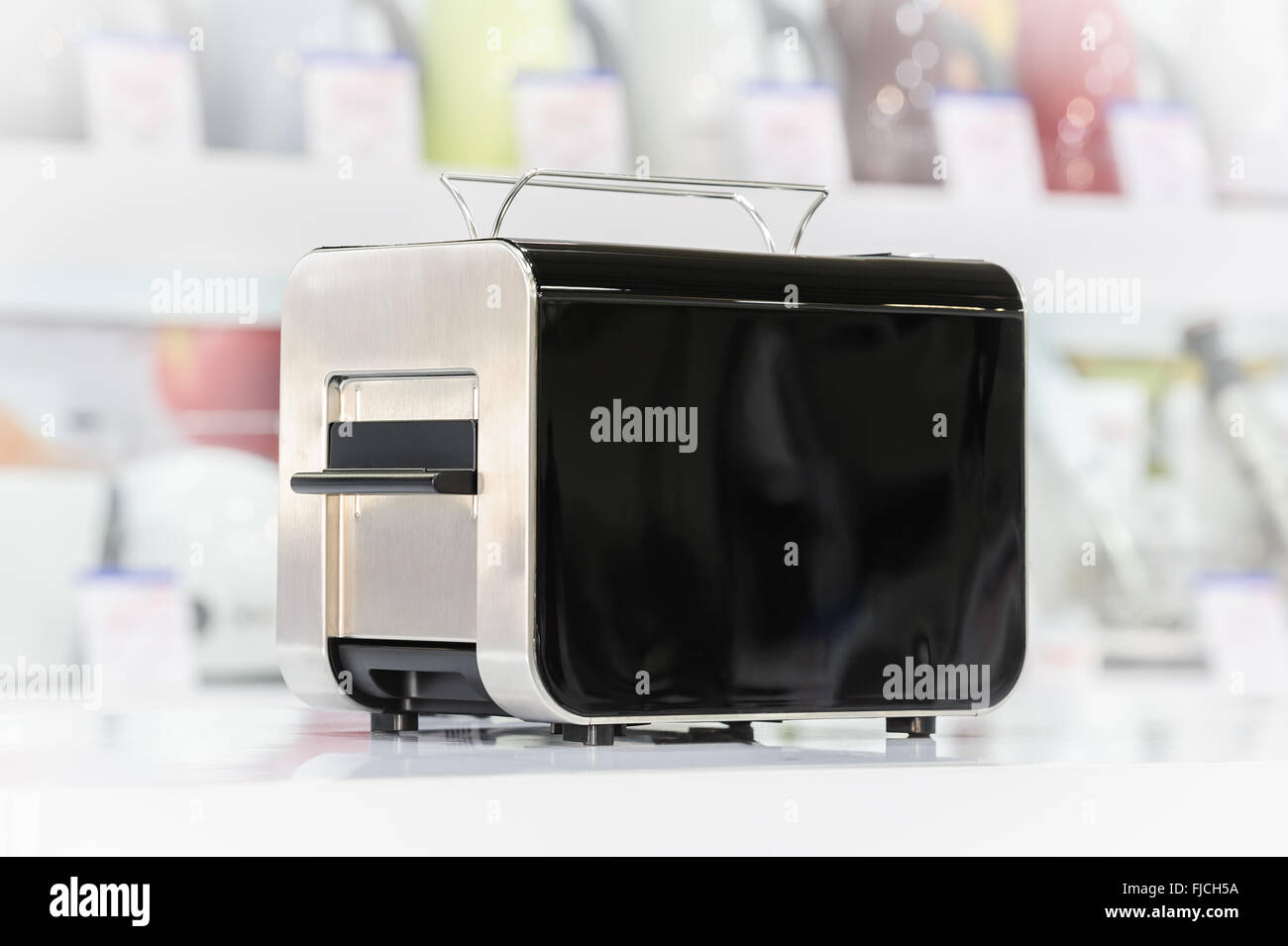Shiny black toaster Stock Photo - Alamy