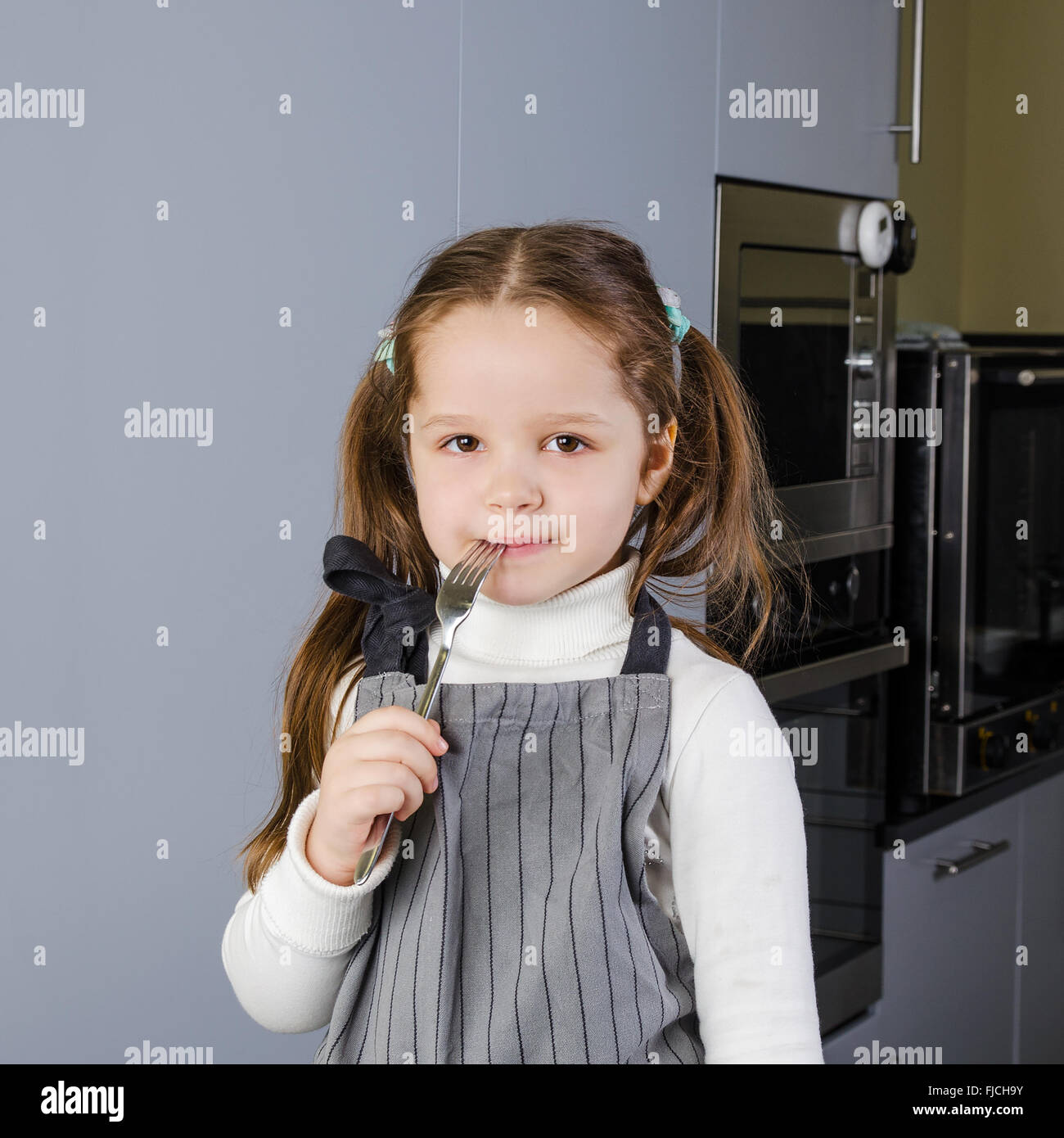Cute little cook Stock Photo - Alamy