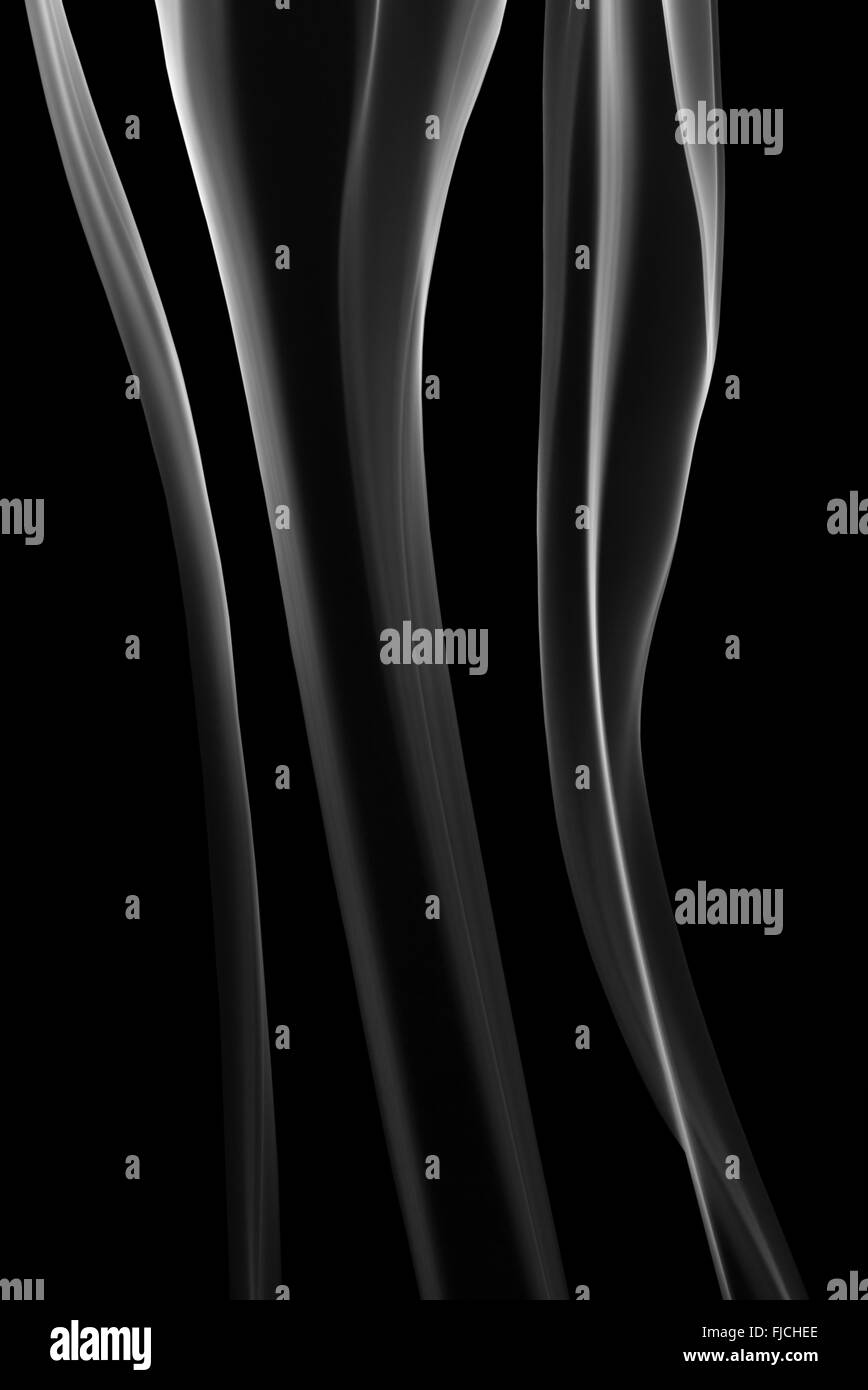 grey steam lines on the black background Stock Photo - Alamy