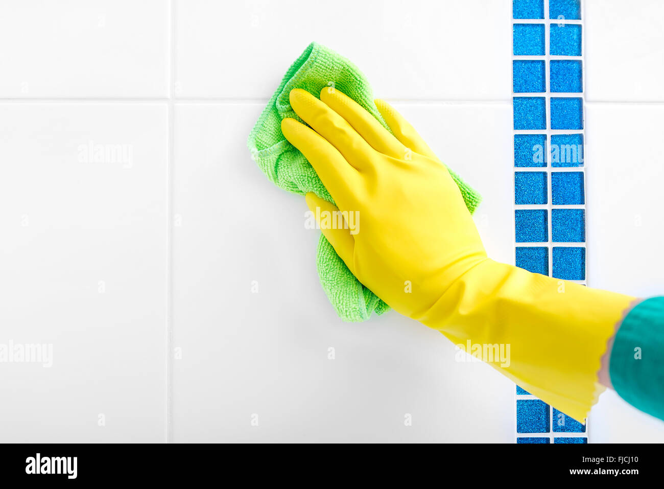 Hand wash a tile Stock Photo - Alamy