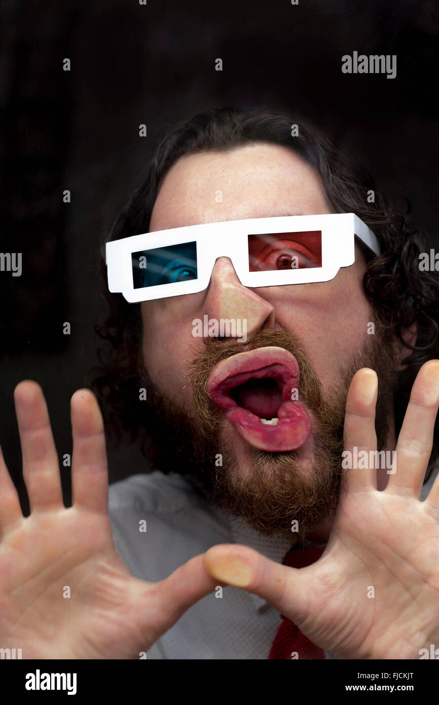 Face pressed against glass hi-res stock photography and images - Alamy