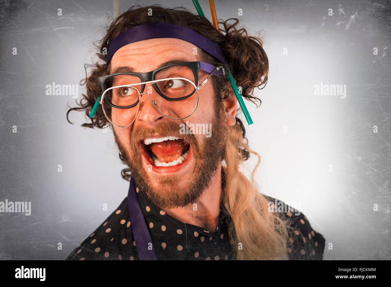 Bearded crazy person lunatic wearing several pairs of glasses Stock ...