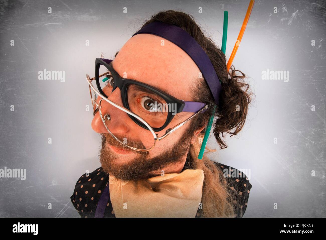 Bearded crazy person lunatic wearing several pairs of glasses Stock ...