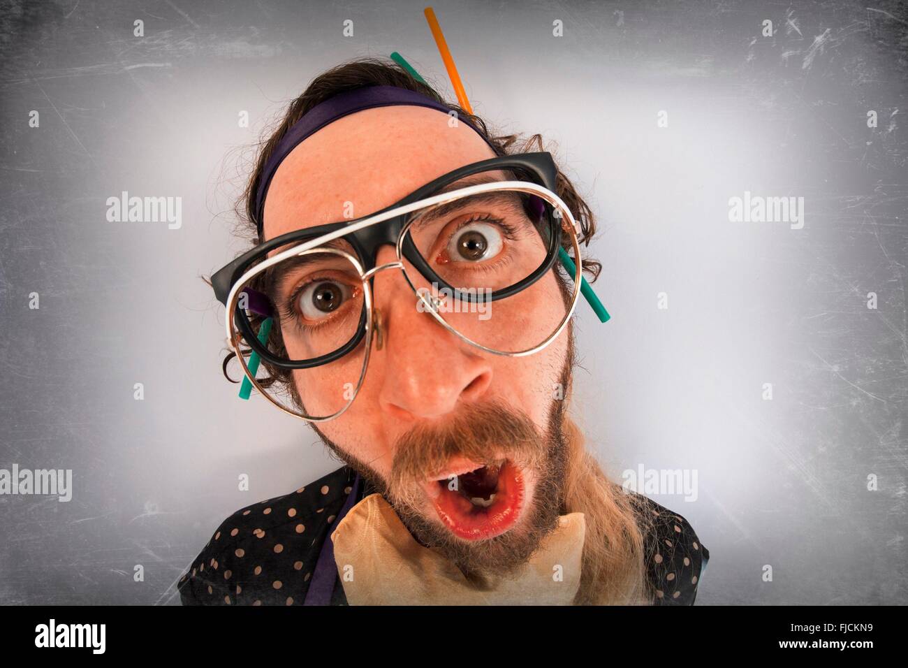 Bearded crazy person lunatic wearing several pairs of glasses Stock ...