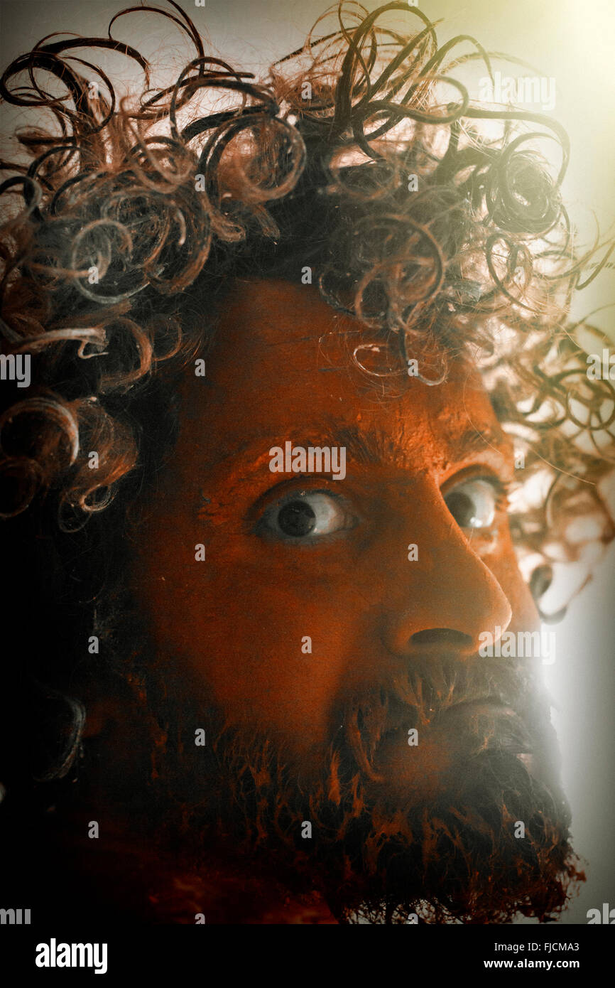 Demon monster man with beard and frightening eyes Stock Photo - Alamy