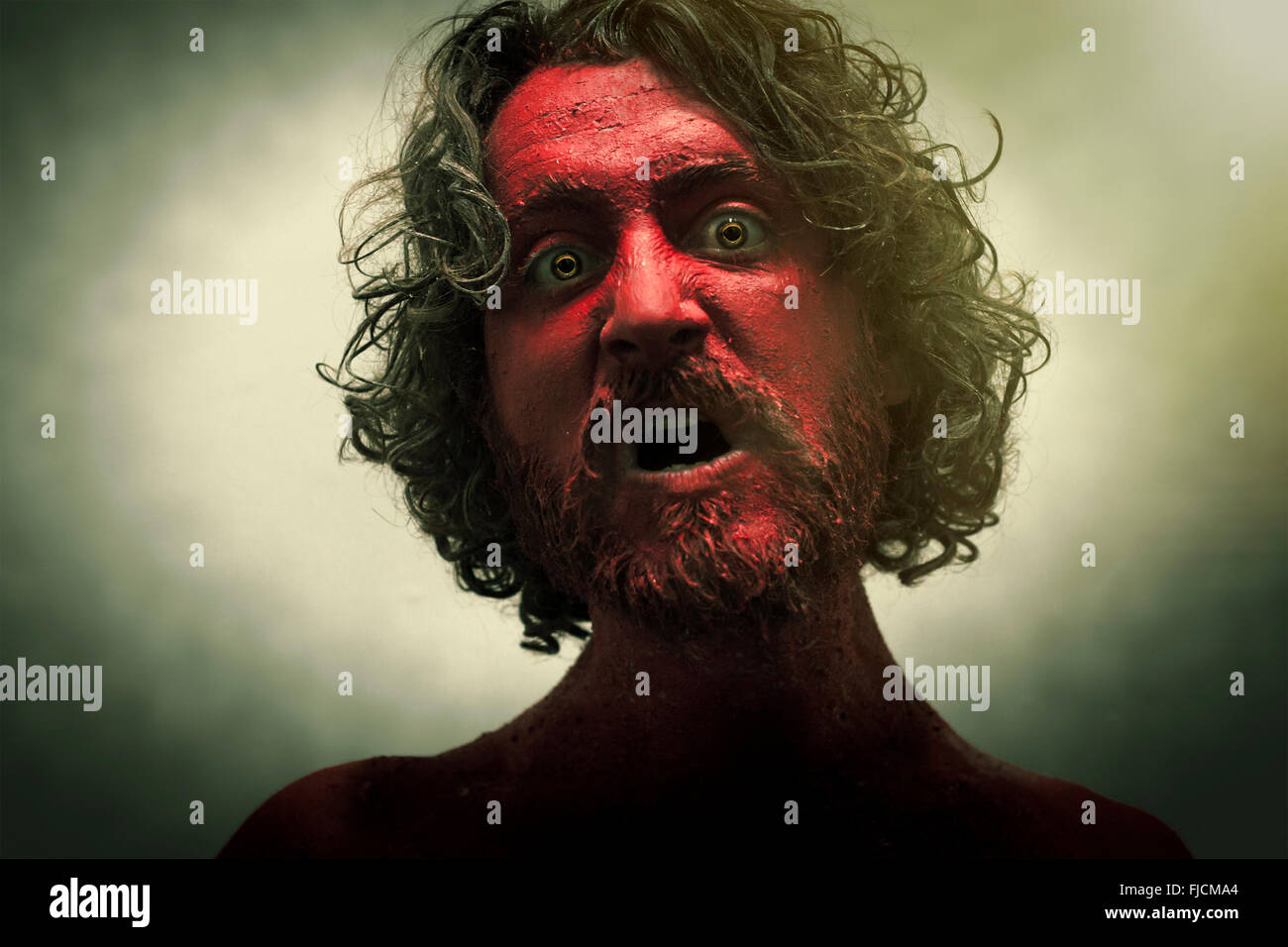 Demon monster man with beard and frightening eyes Stock Photo - Alamy