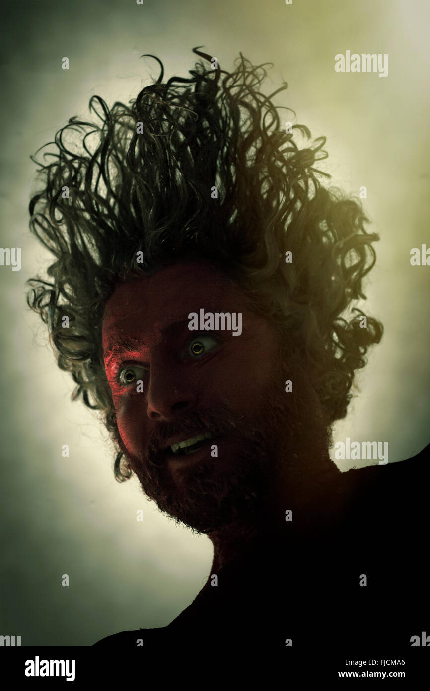 Demon monster man with beard and frightening eyes Stock Photo - Alamy