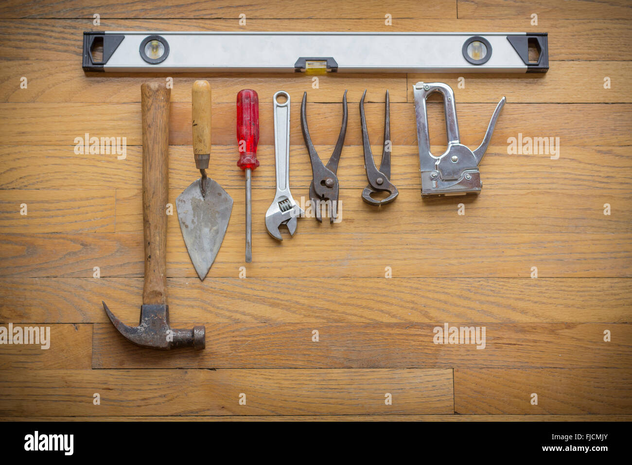 Bunch of workers old worn tools on grunge wood surface Stock Photo - Alamy