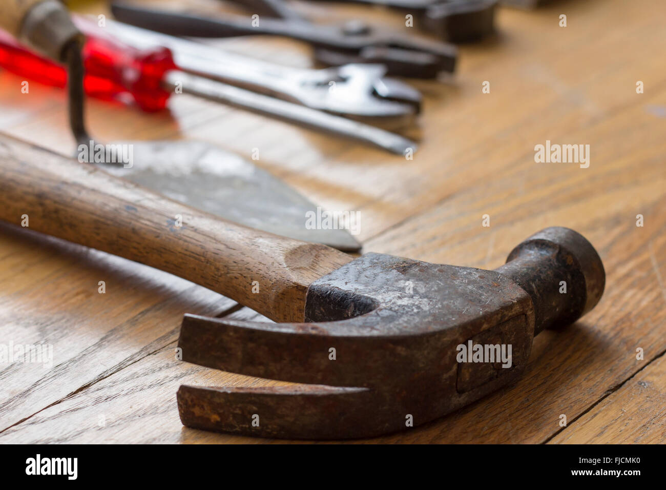 Bunch of workers old worn tools on grunge wood surface Stock Photo - Alamy