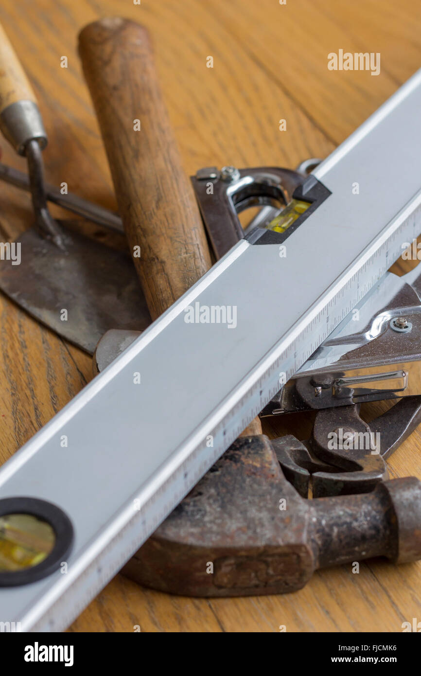 Bunch of workers old worn tools on grunge wood surface Stock Photo - Alamy