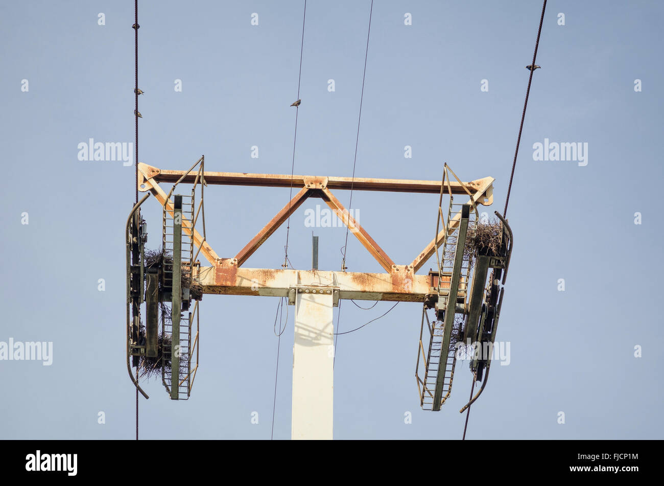 Somewhat weathered and rusty cableway pylon Stock Photo - Alamy