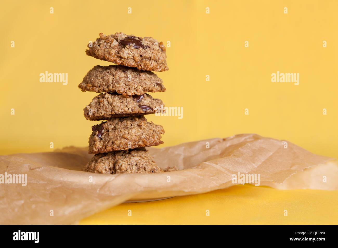 Oatmeal Cookies with a colorful yellow backdrop Stock Photo - Alamy