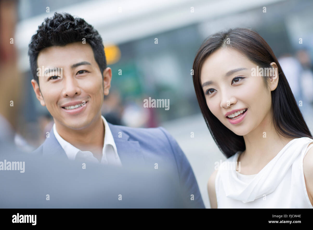 Chinese businesspeople talking outdoors hi-res stock photography and ...