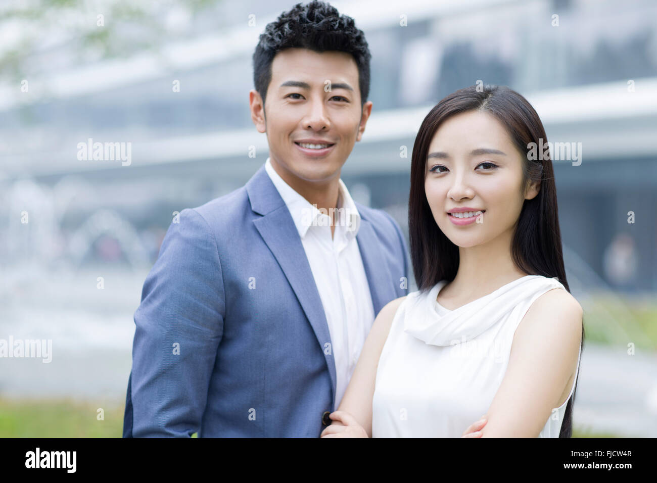 Portrait of confident Chinese businesspeople Stock Photo - Alamy