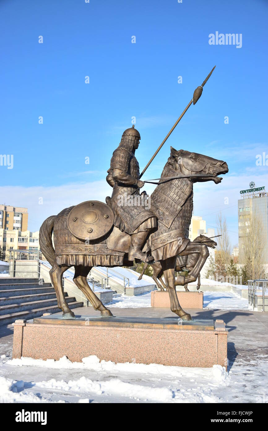 Statue featuring a historical Kazakh warrior, in the street of Astana ...