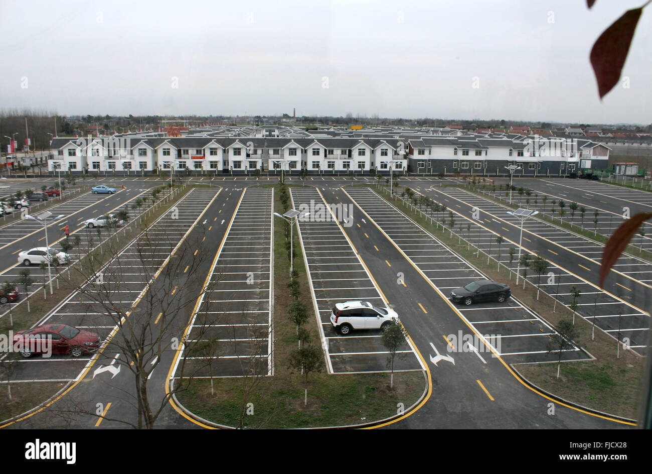 Neat arrangement of small town buildings and parking lots Stock Photo ...