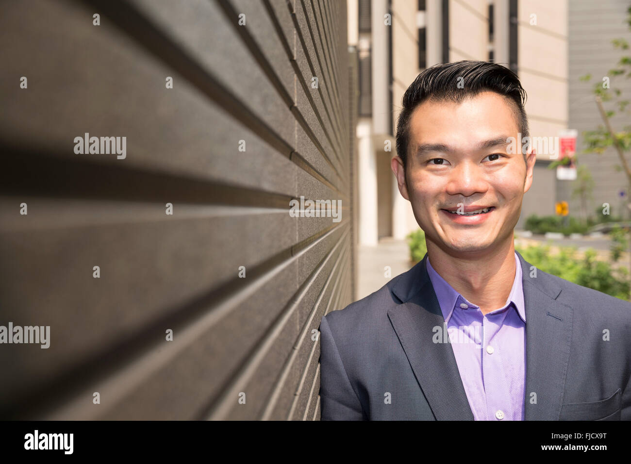 Asian man looking in camera hi-res stock photography and images - Alamy