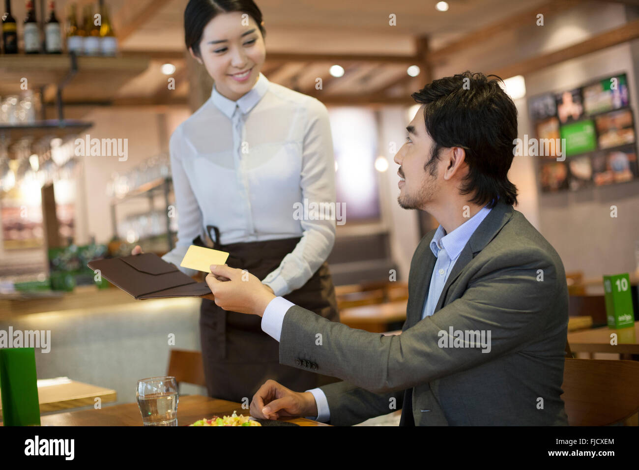 Gold restaurant bill hi-res stock photography and images - Alamy