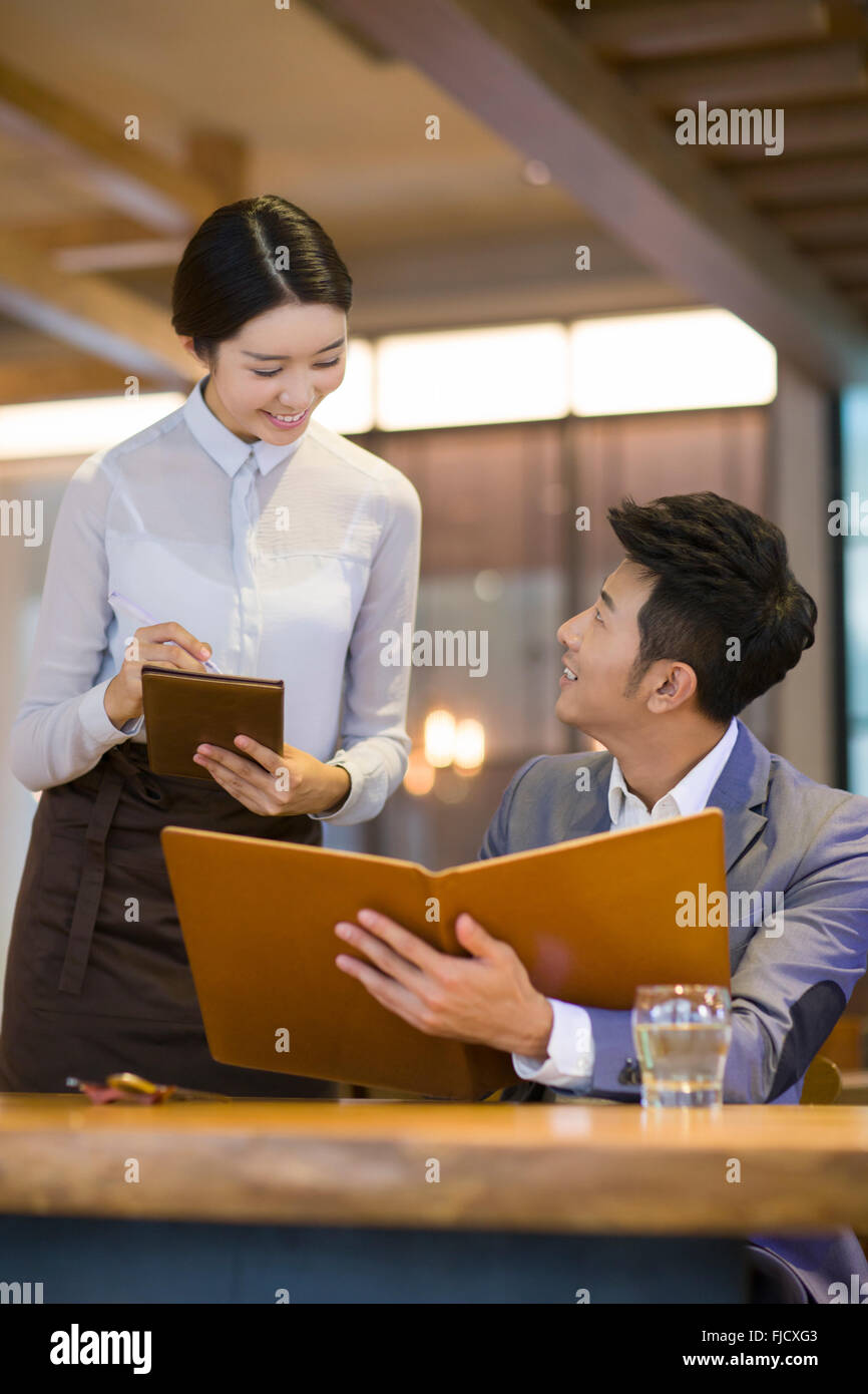 Ordering food at diner hi-res stock photography and images - Alamy