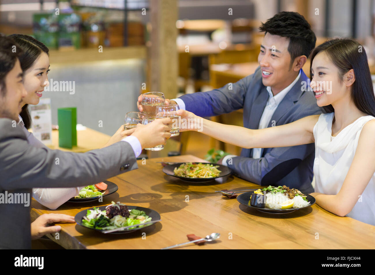 Chinese friends having dinner together Stock Photo - Alamy