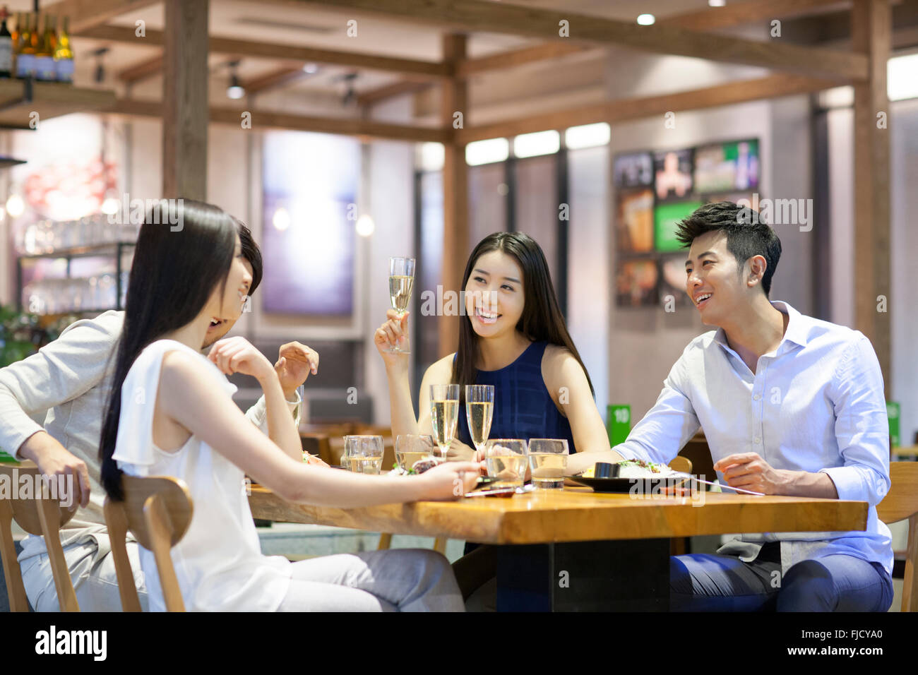 Chinese friends having dinner together Stock Photo - Alamy