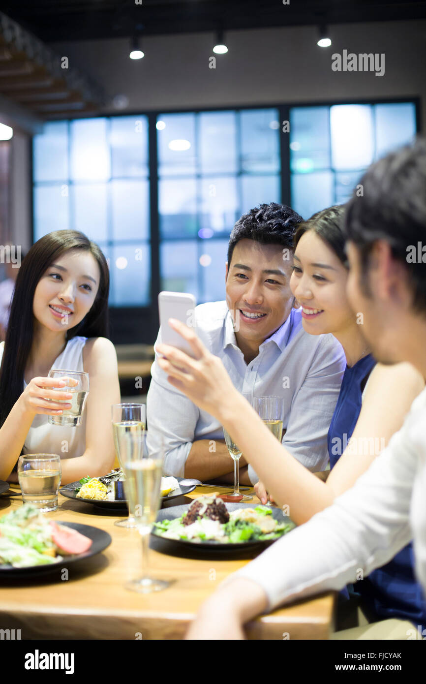 Four friends having dinner top hi-res stock photography and images - Alamy