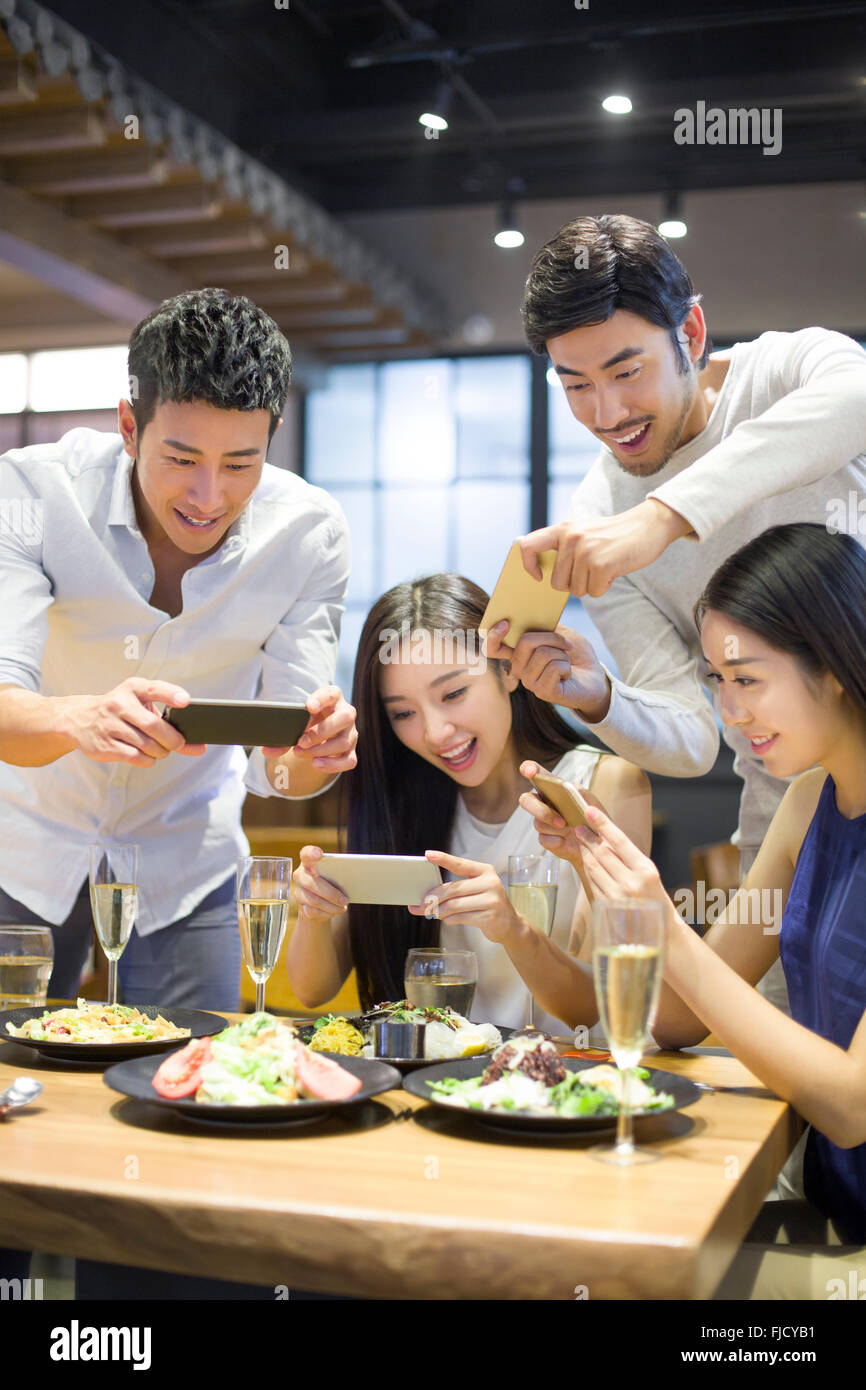 Chinese friends having dinner together Stock Photo - Alamy