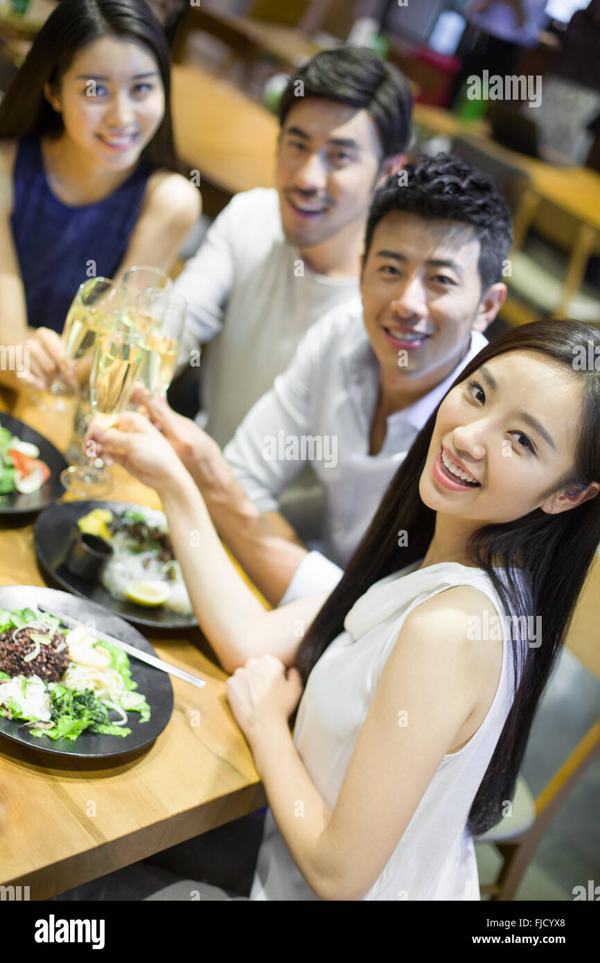 Chinese friends having dinner together Stock Photo - Alamy