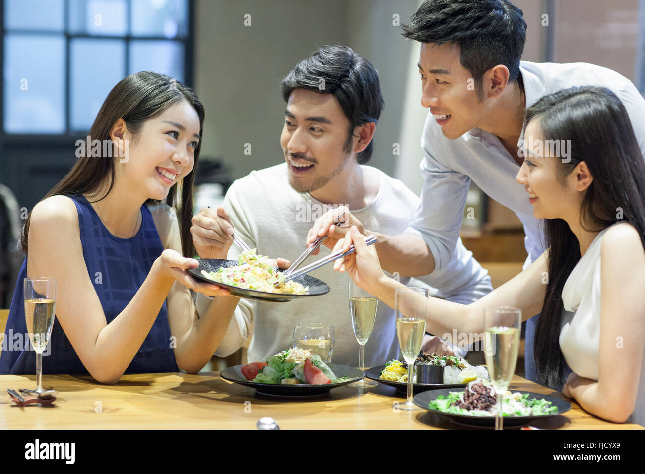 Men sharing meals hi-res stock photography and images - Alamy