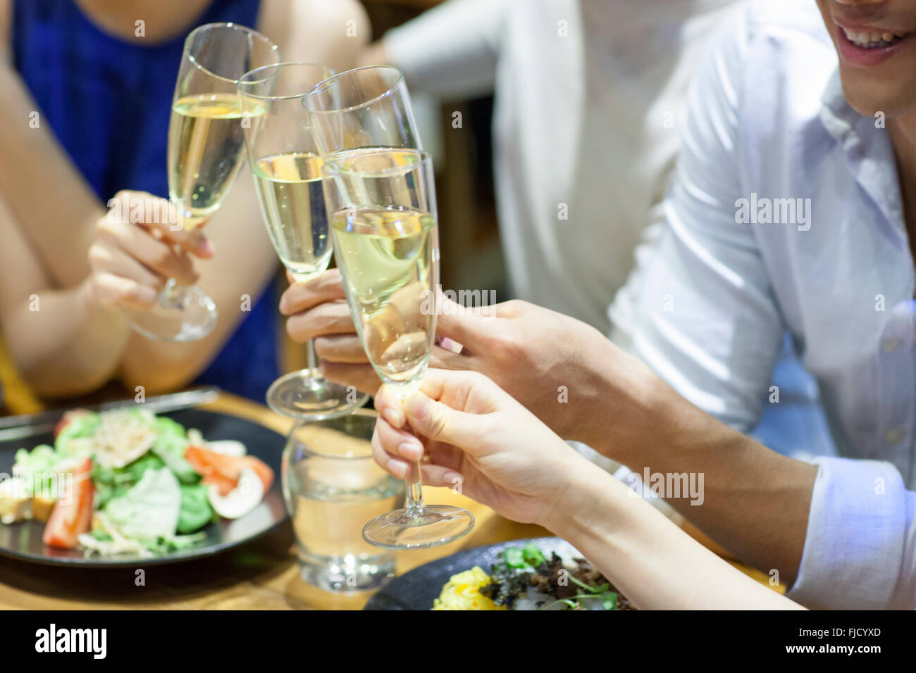 Four friends having dinner top hi-res stock photography and images - Alamy
