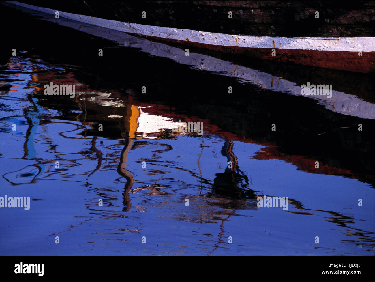 Boat reflection in water Stock Photo - Alamy