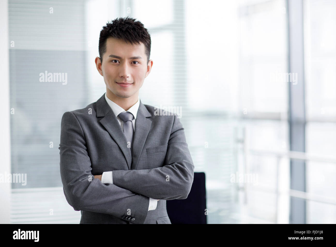 Portrait of Chinese businessman Stock Photo - Alamy