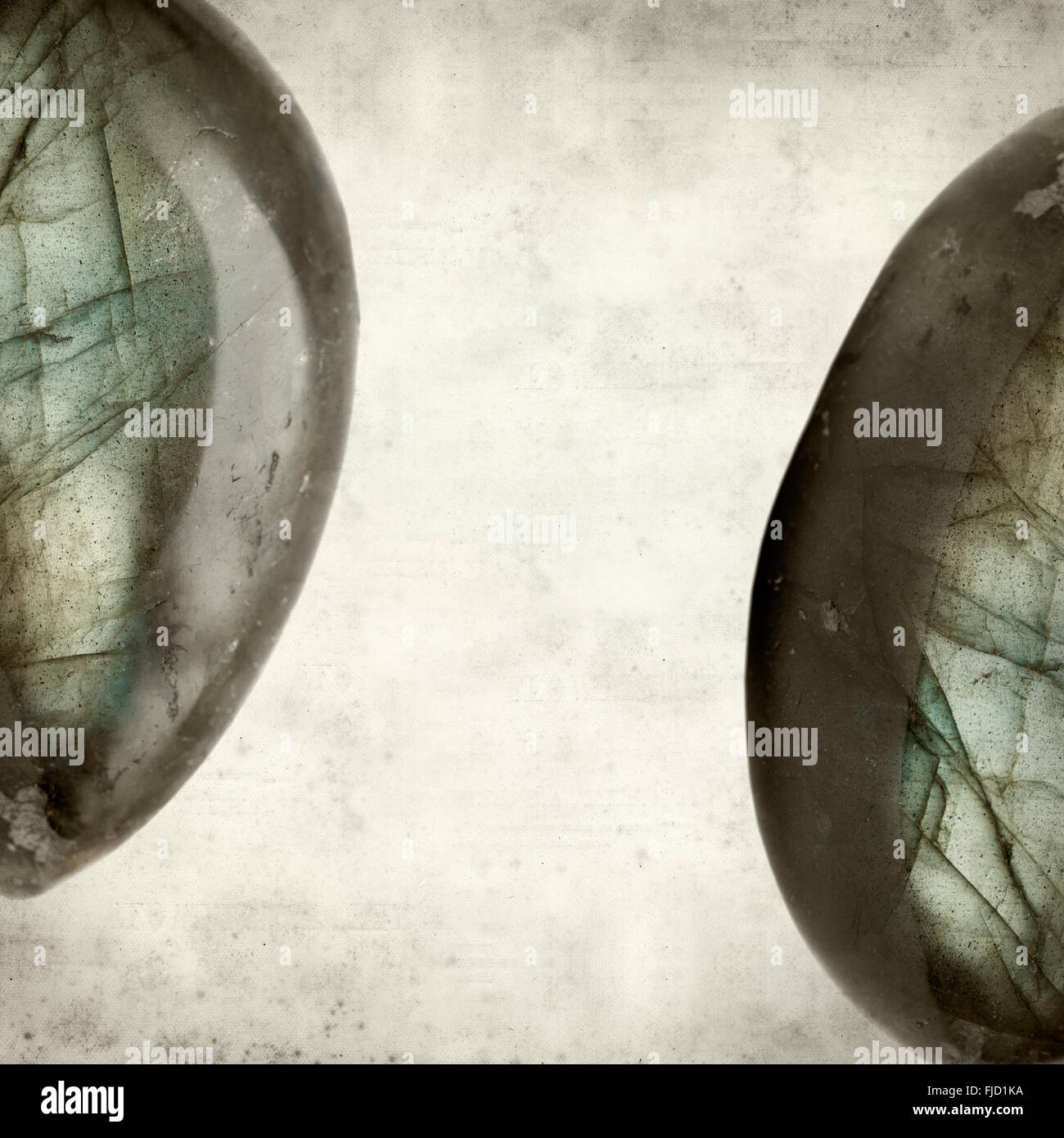 textured old paper background with spectrolite, gemstone variety of ...
