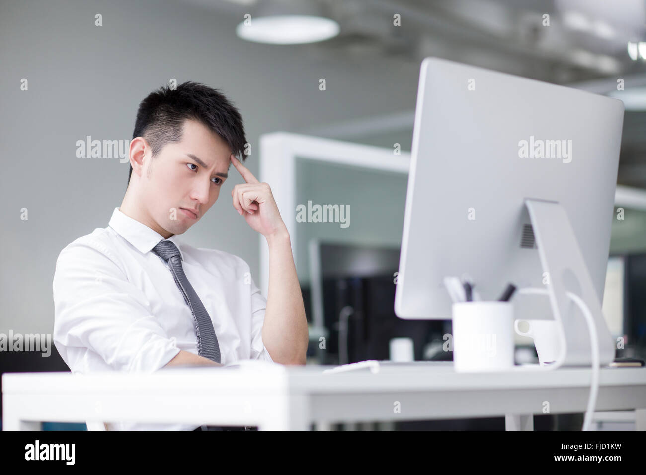 Burdened chinese man hi-res stock photography and images - Alamy
