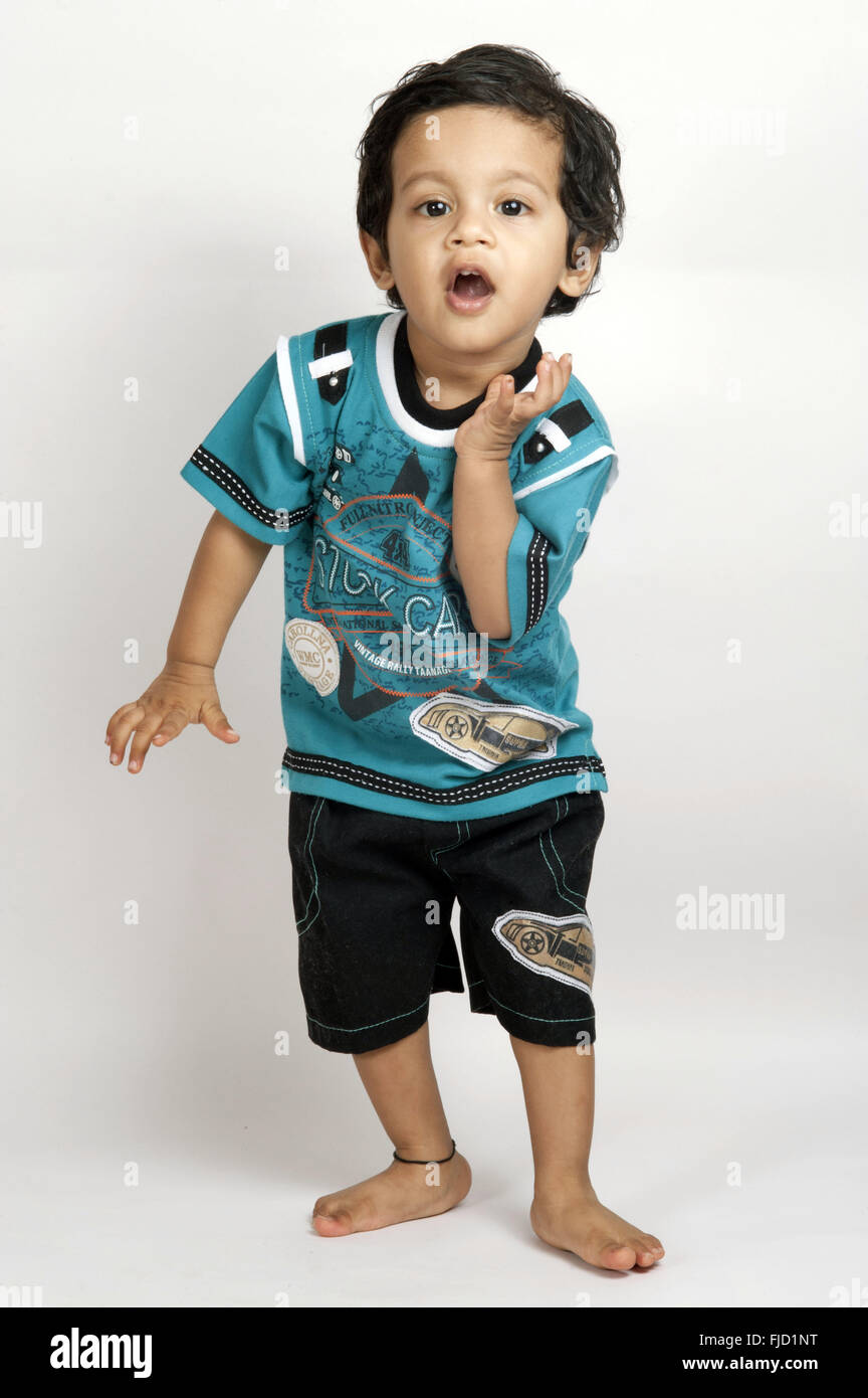 Indian child boy standing pose hi-res stock photography and images - Alamy