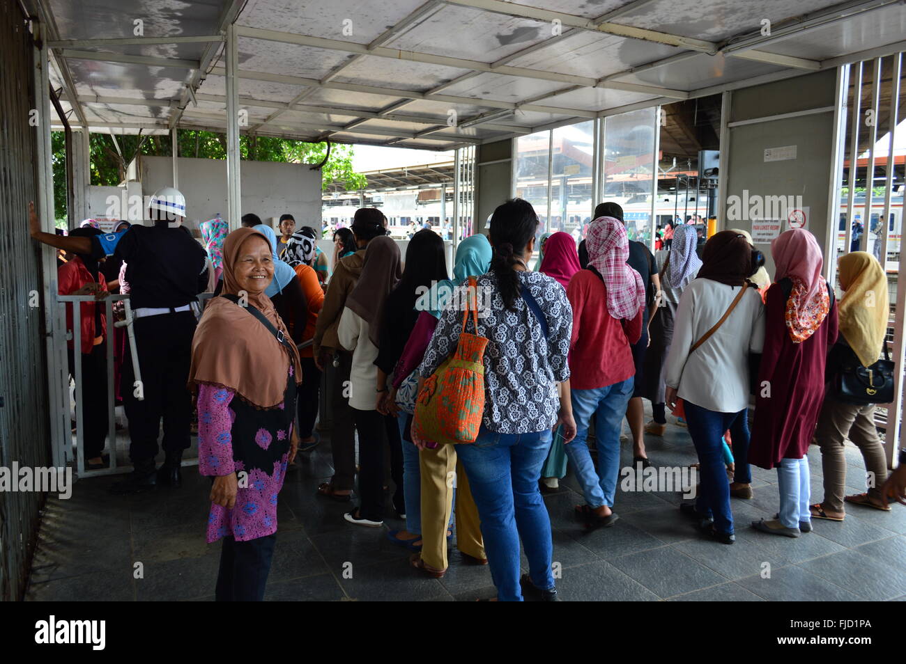Passenger on commuter line jakarta in Jakarta Indonesia Stock Photo - Alamy
