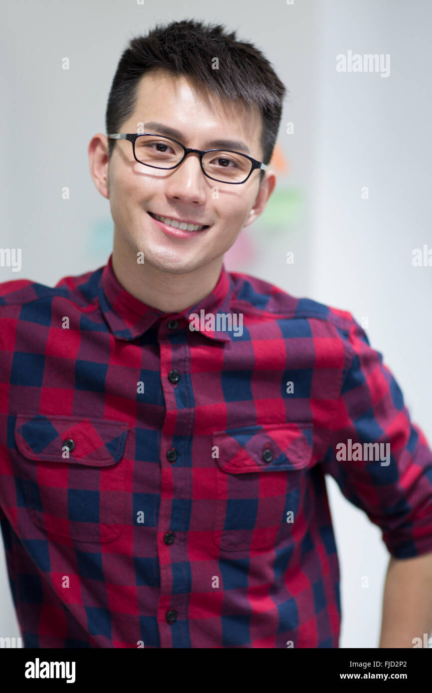 Portrait of young Chinese man Stock Photo - Alamy