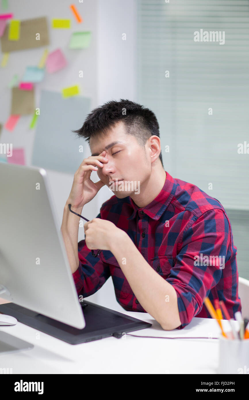 Chinese young tired hi-res stock photography and images - Alamy
