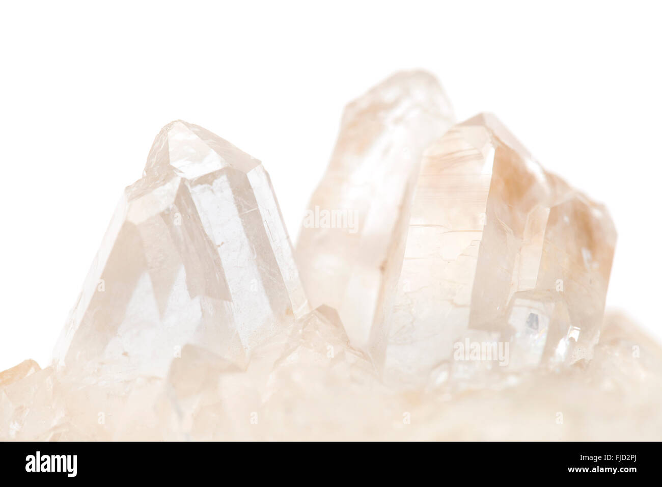 cluster of small quartz crystals isolated on white background Stock ...