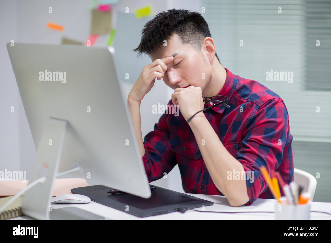 Chinese young tired hi-res stock photography and images - Alamy