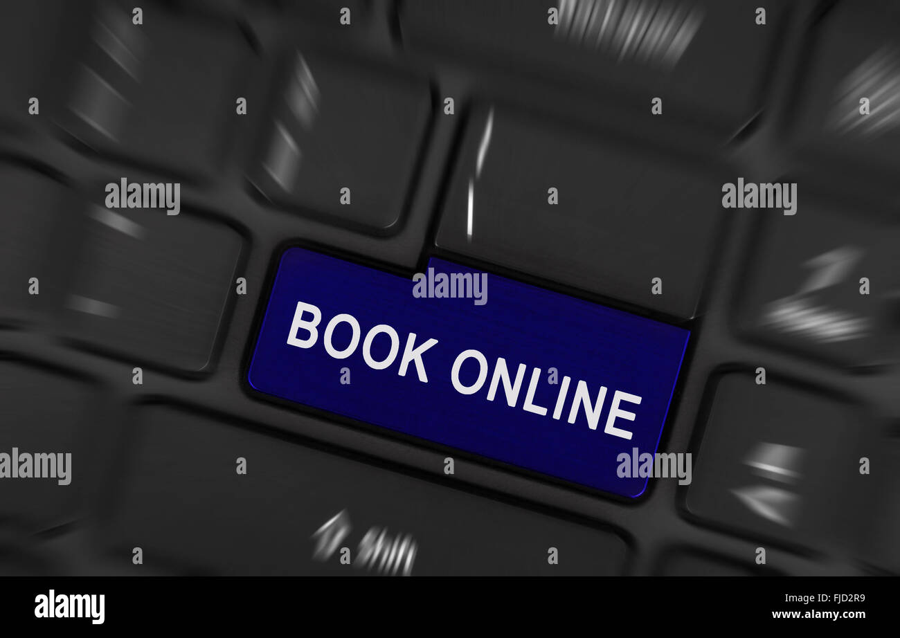 Blue book online button on laptop keyboard Stock Photo - Alamy