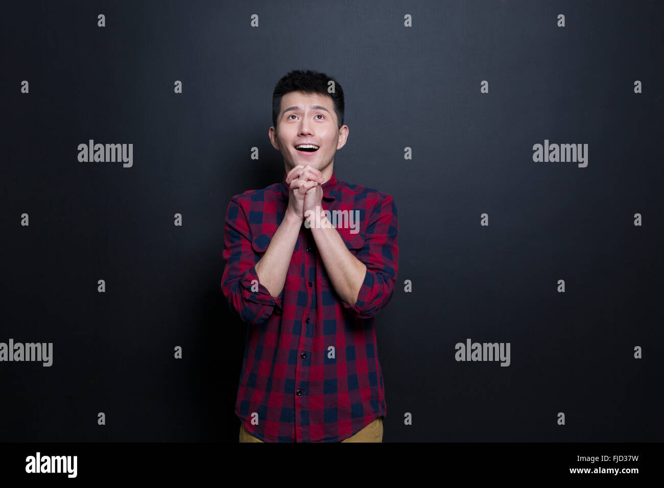 Chinese man praying hi-res stock photography and images - Alamy