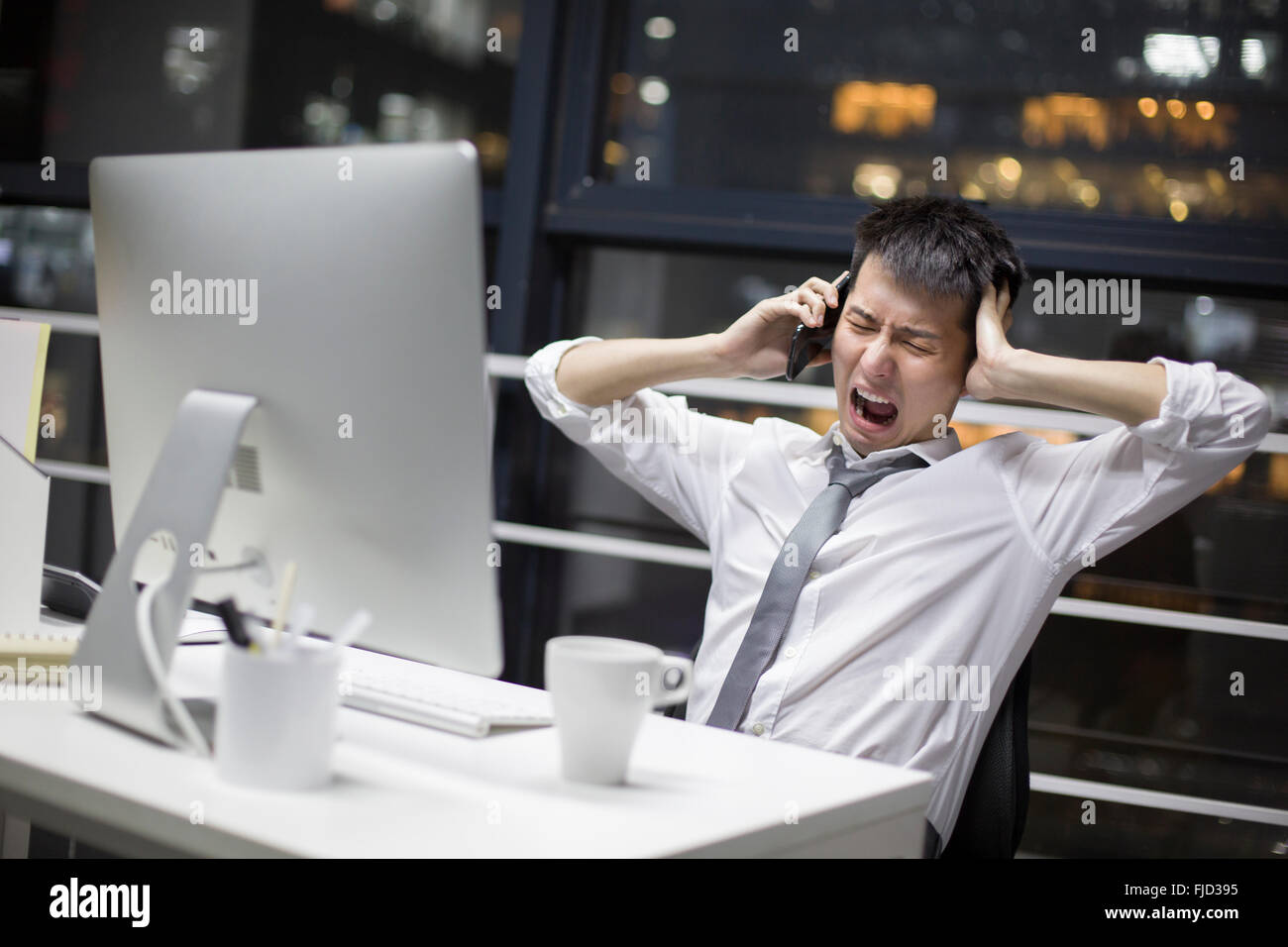 Distraught businessman hi-res stock photography and images - Alamy