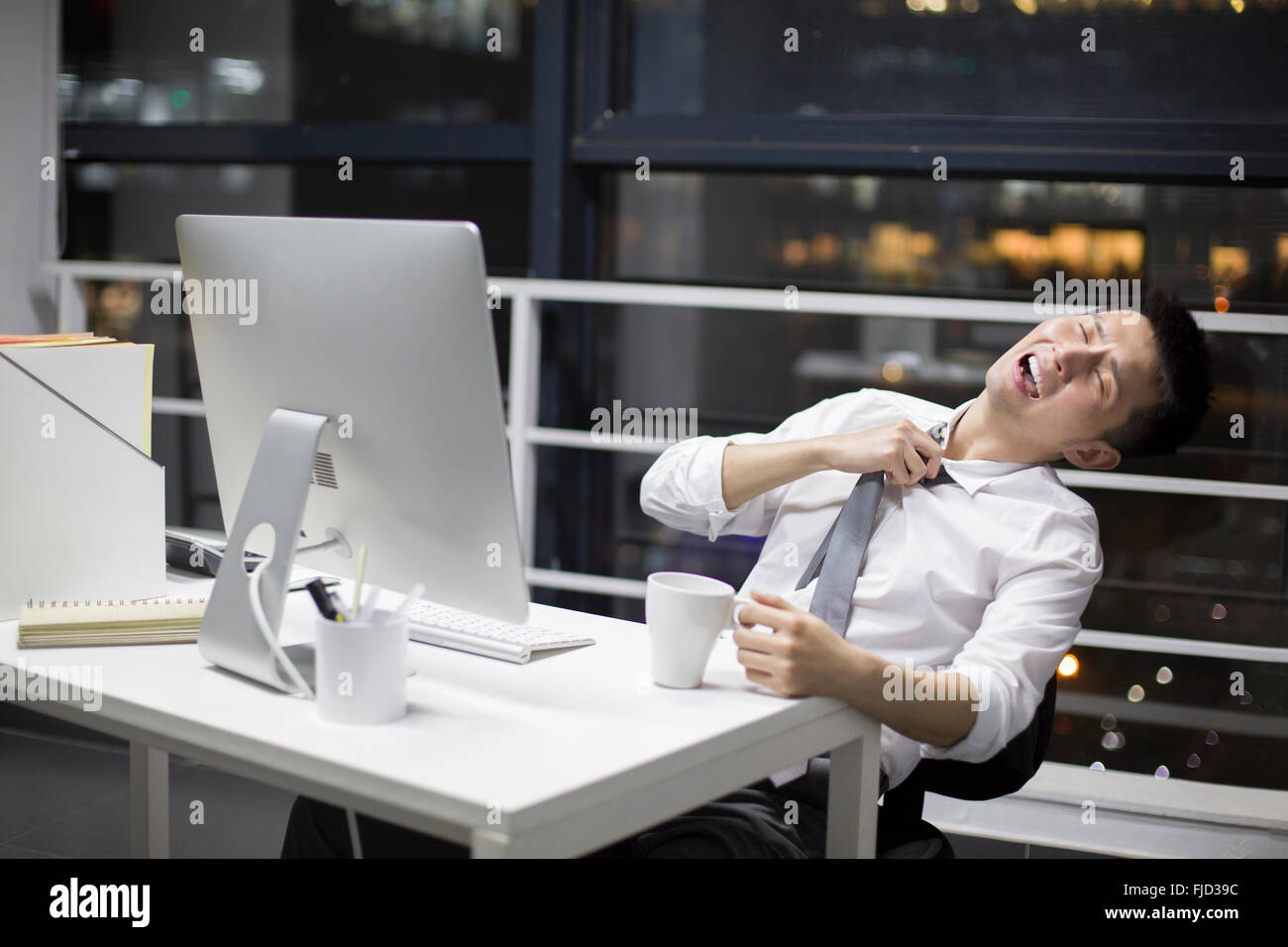 Burdened chinese man hi-res stock photography and images - Alamy