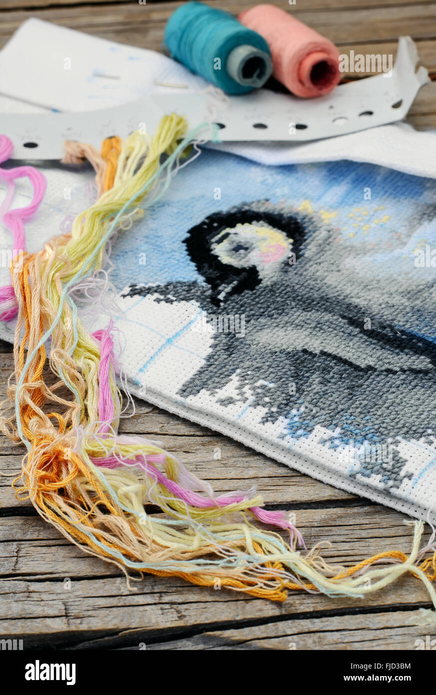 Set of threads for embroidery on background of handmade paintings Stock ...