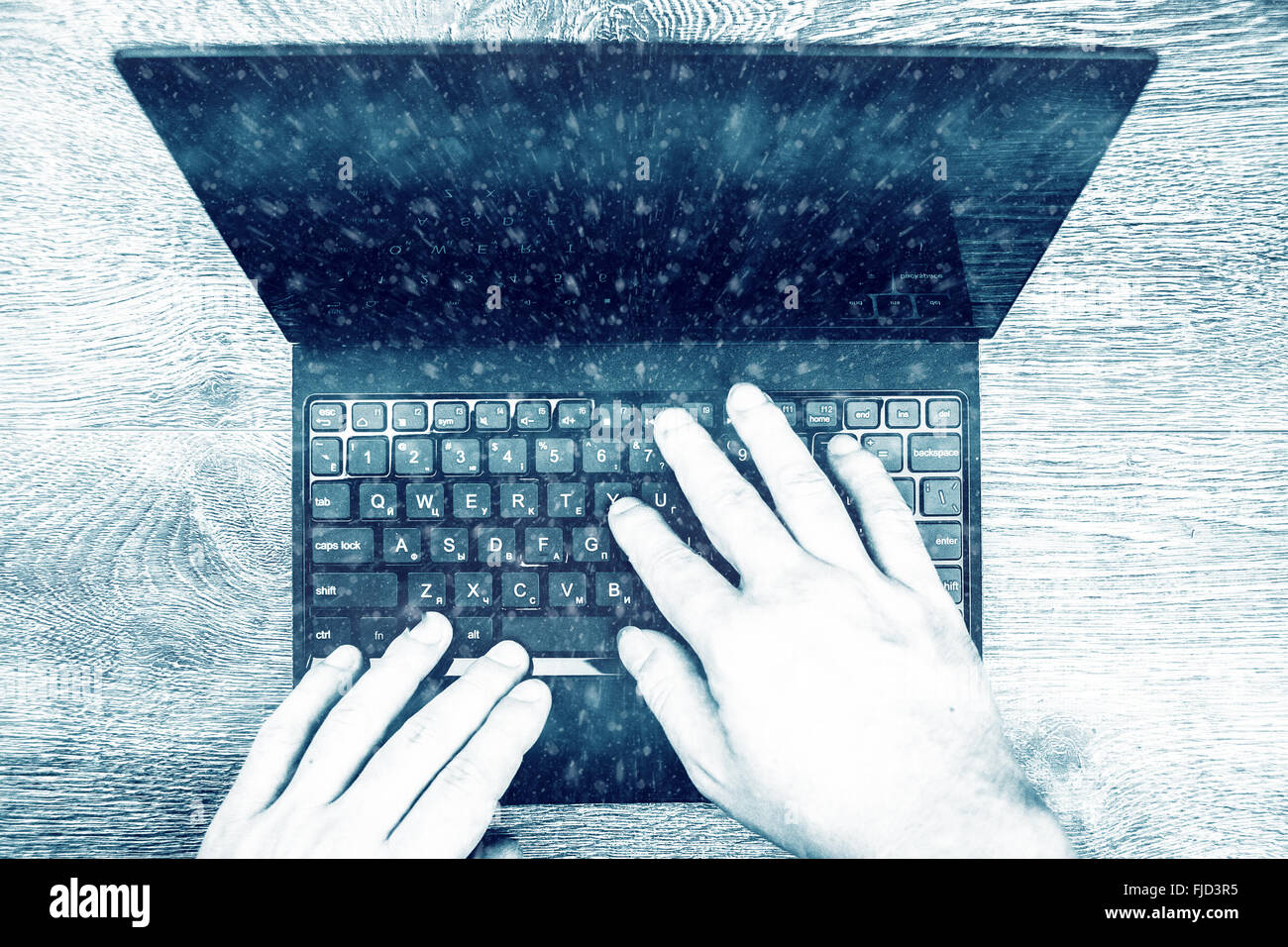 laptop with hands on wood Stock Photo - Alamy