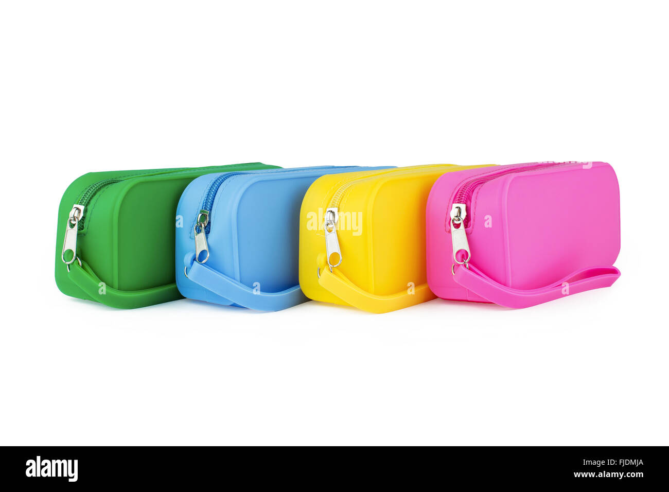 Assorted colorful pencil cases isolated on white background with shadow ...